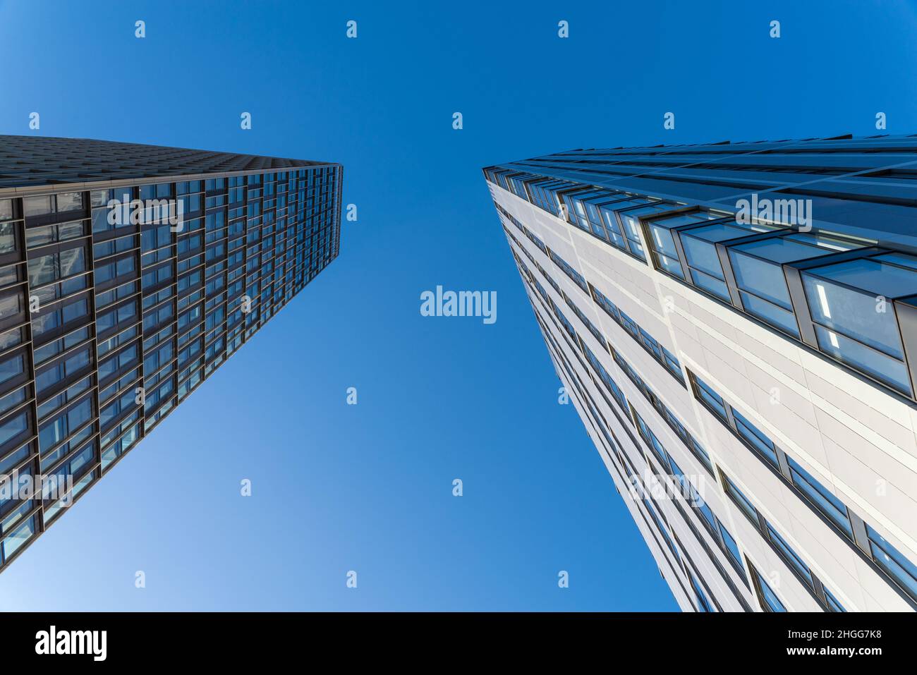 Looking up at two tall buildings on Broad Street, Birmingham against ...