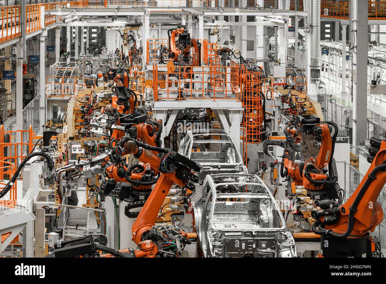 Photo of automobile production line. Welding car body. Modern car ...