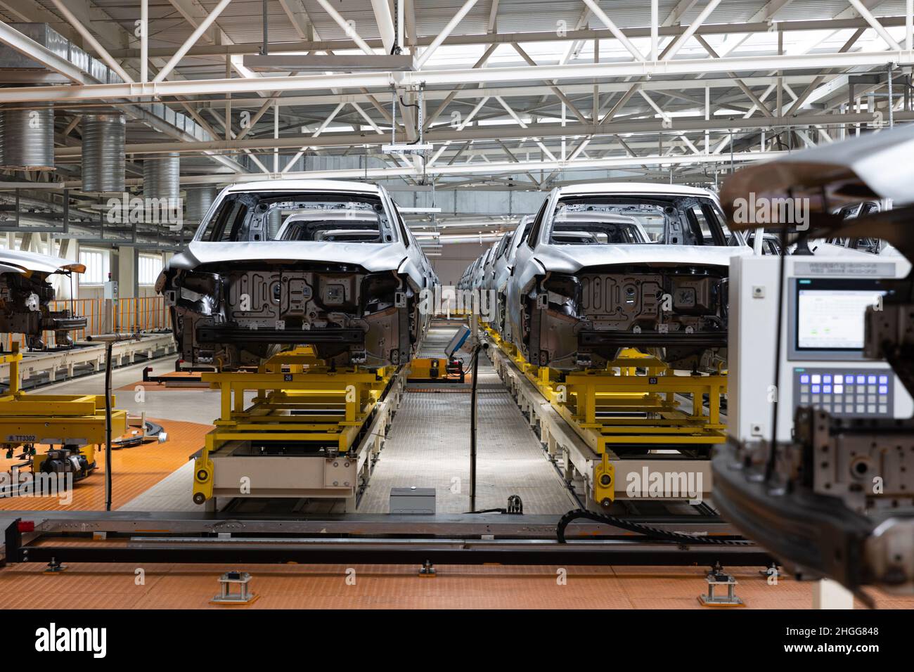 Photo of automobile production line. Modern car assembly plant. Auto ...