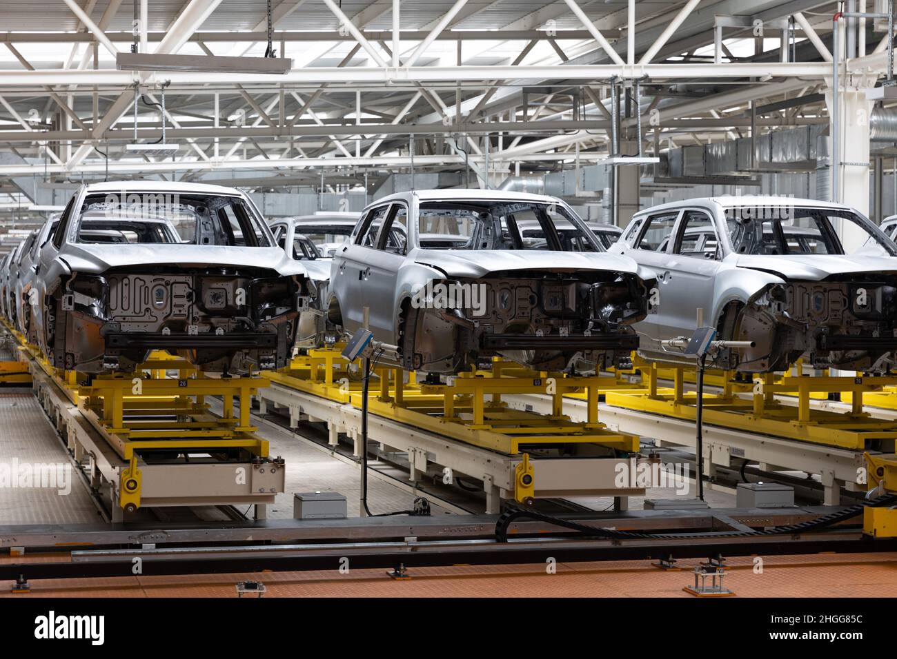 Photo of automobile production line. Welding car body. Modern car ...