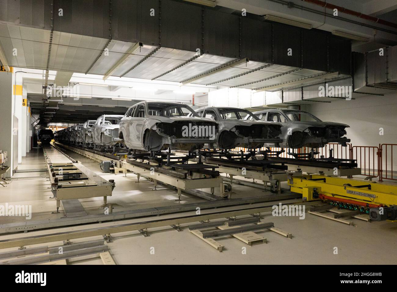 Car bodies are on assembly line. Modern automotive industry. Automobile ...
