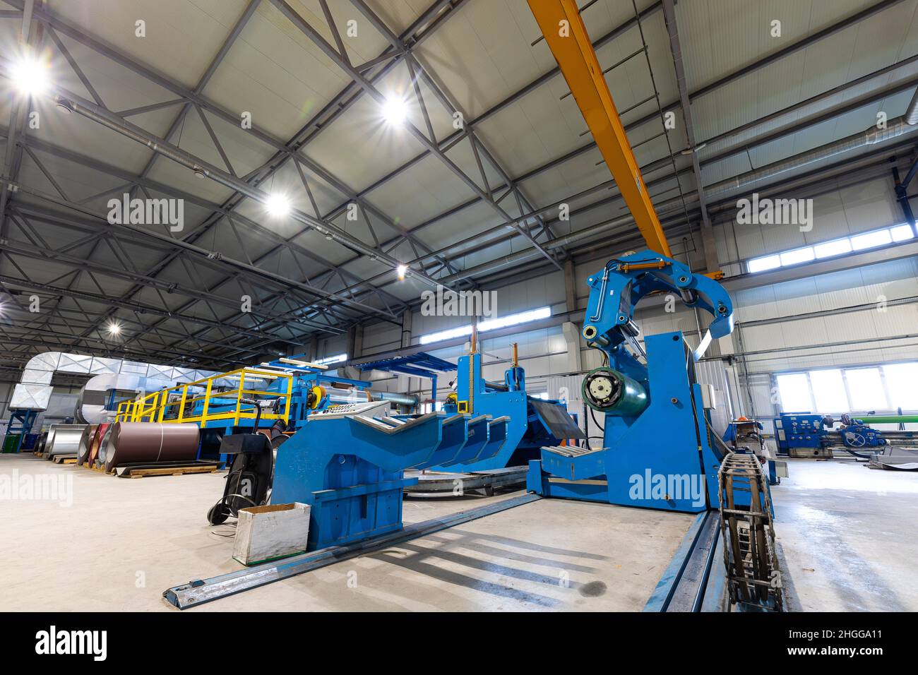 Production line of metal tile for roof. Steel forming machine in ...