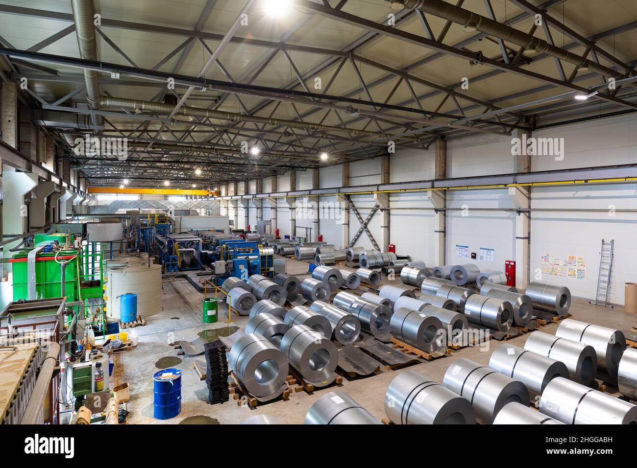 Photo of production line of metal tile for roof. Steel forming machine ...