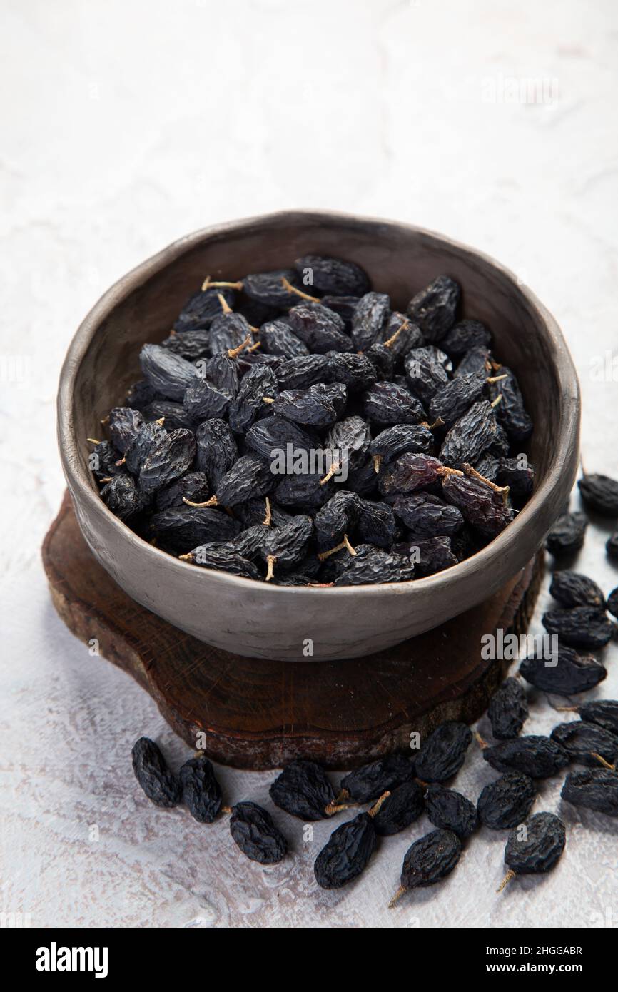 Dark raisins on light background. Dried Fruits Stock Photo - Alamy