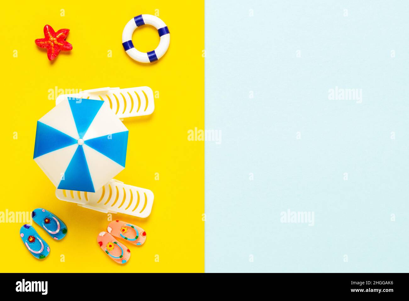 Aerial view of yellow sand beach with sun umbrella and different beach ...