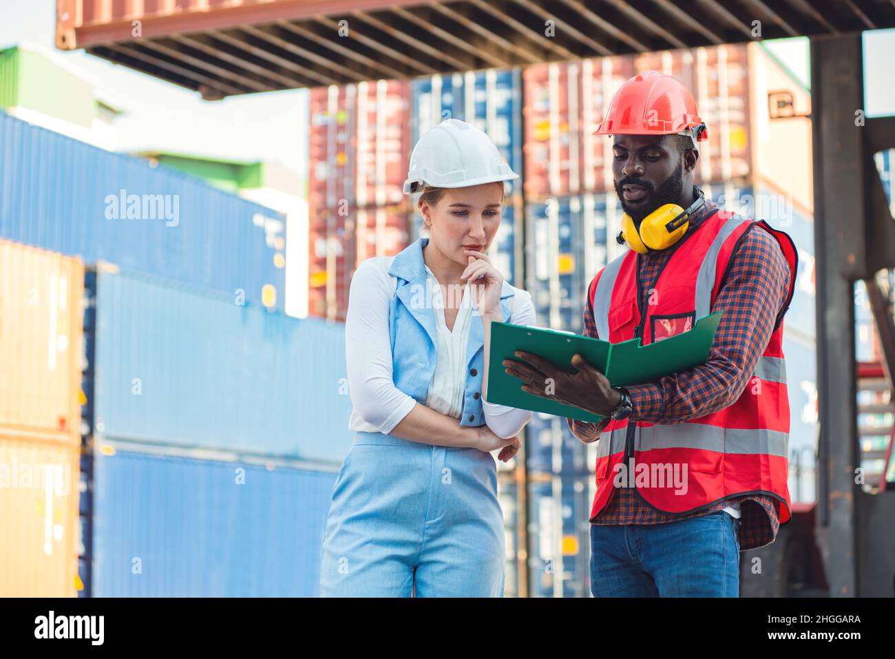 The Problem with businesswoman and engineer talking and checking ...