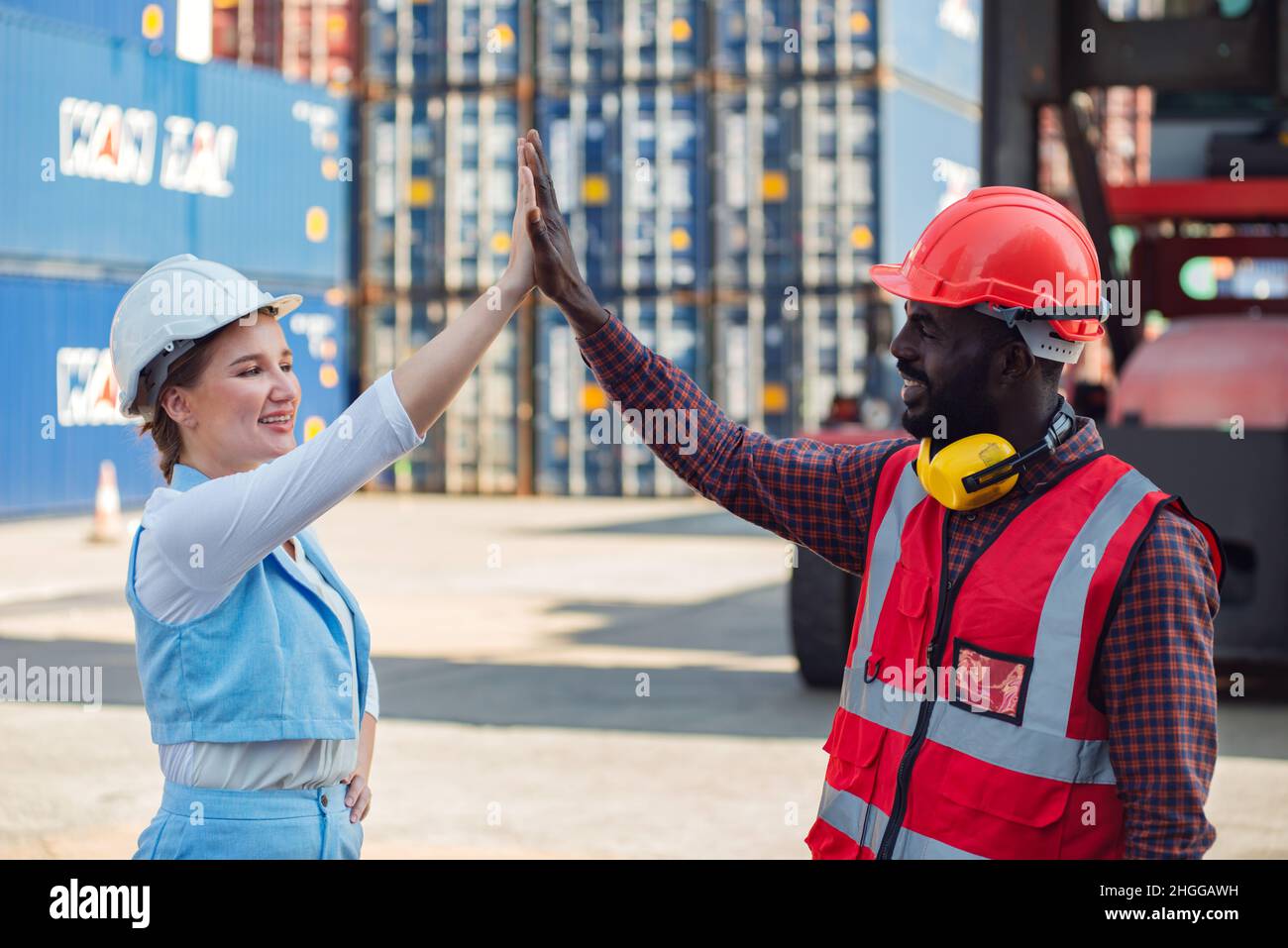 Happy giving hands two businesswoman and engineer working checking ...