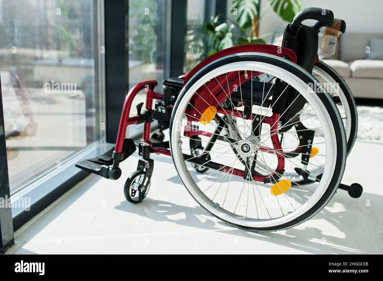 Empty wheelchair at home. Wheel chair indoor Stock Photo - Alamy