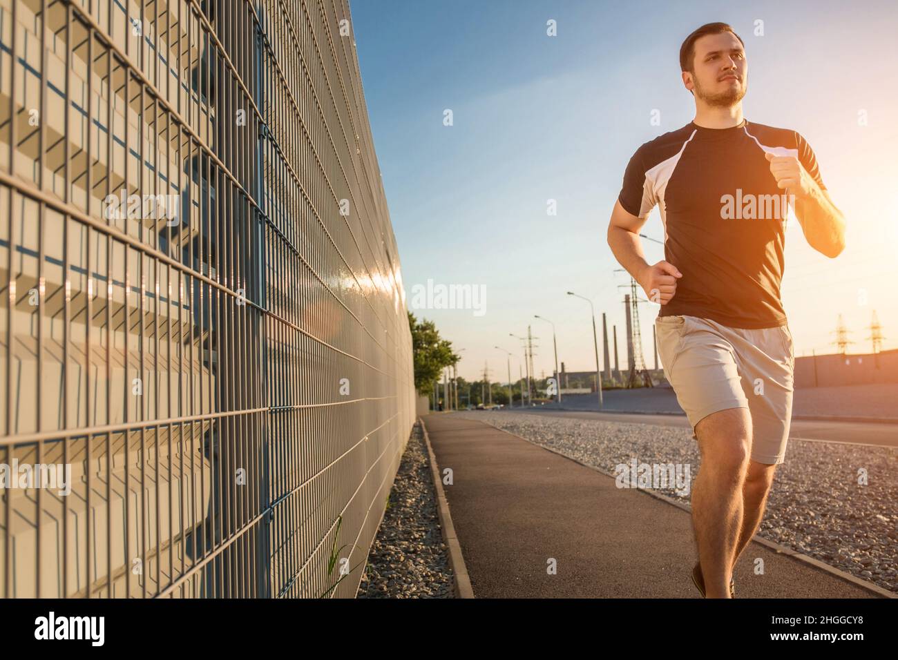 Full length portrait of athletic man running Stock Photo - Alamy