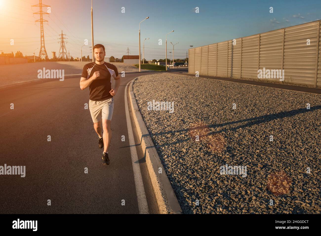 Full length portrait of athletic man running Stock Photo - Alamy