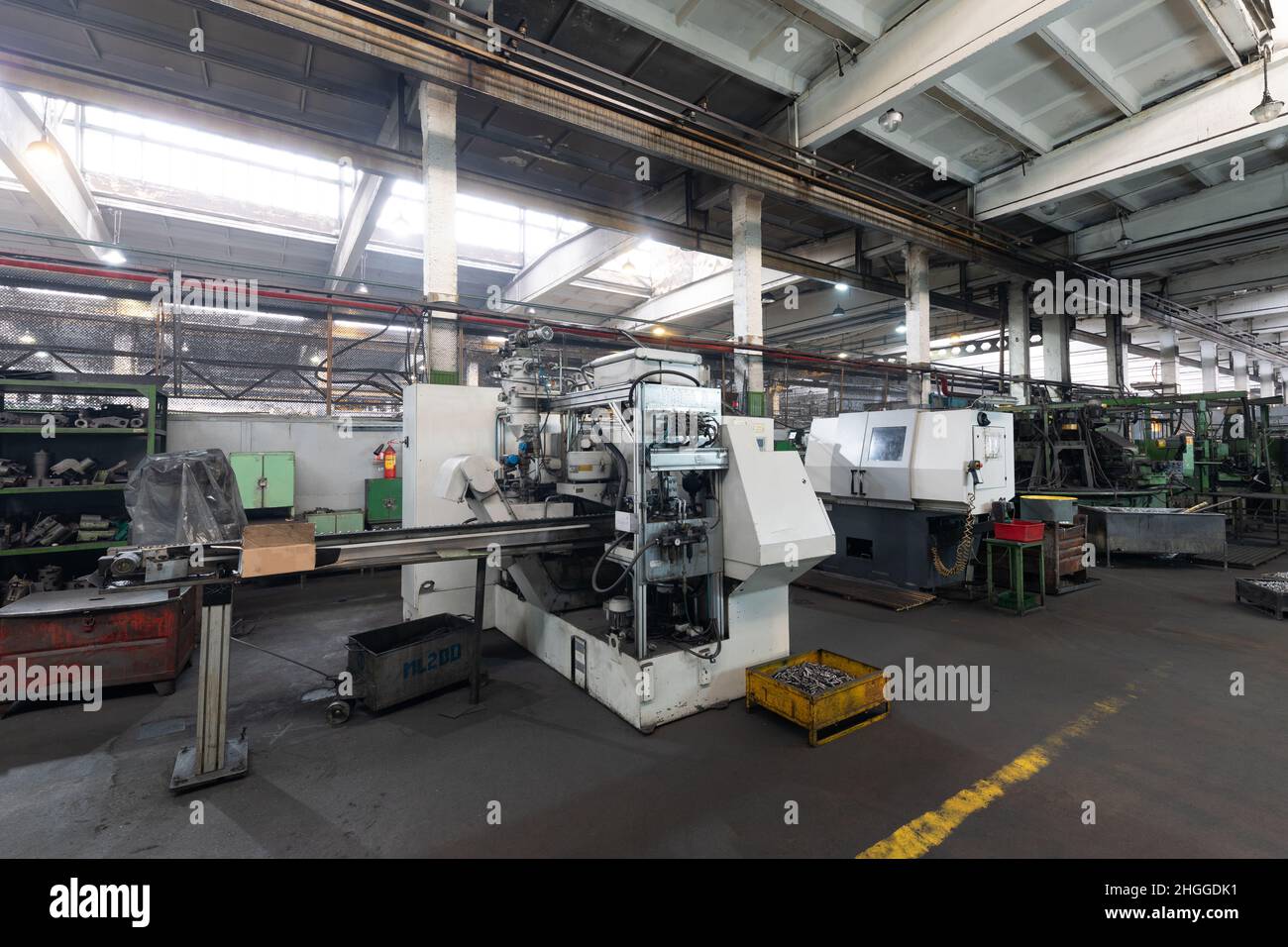 The interior of a big industrial building of factory with steel ...
