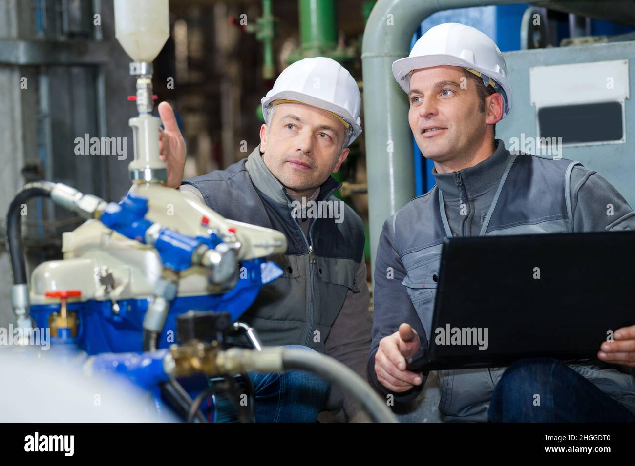 supervising production line inside the factory Stock Photo - Alamy