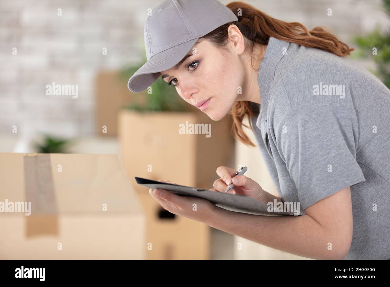 small business owner warehouse home officer Stock Photo - Alamy