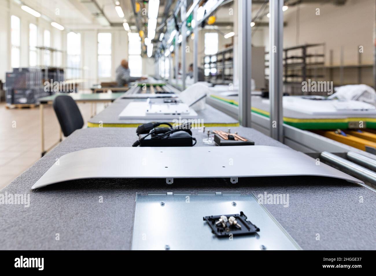 Close-up photo of a conveyor belt at a monoblock computer assembly ...