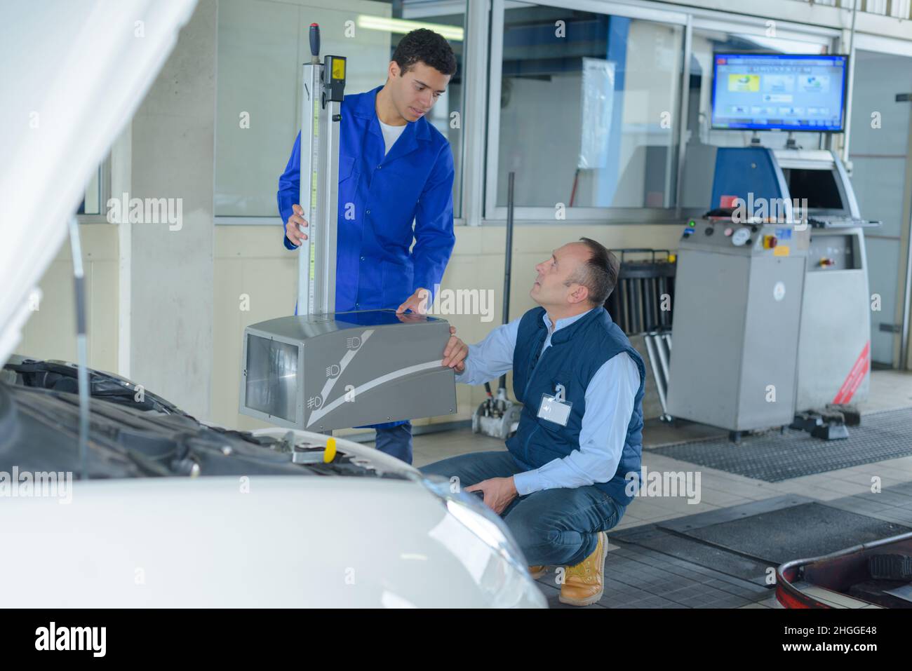 Two mechanics fix car hi-res stock photography and images - Alamy
