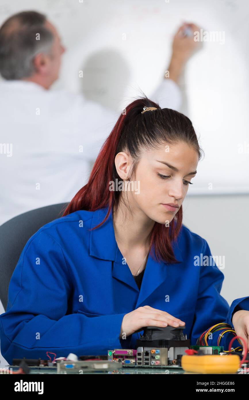 young woman using a multimeter Stock Photo - Alamy