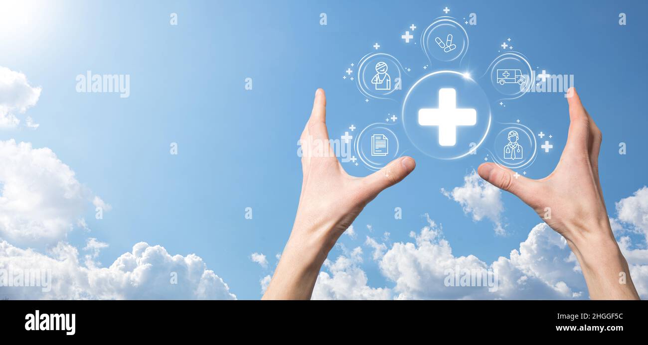Businessman hold virtual plus medical network connection icons. Covid ...