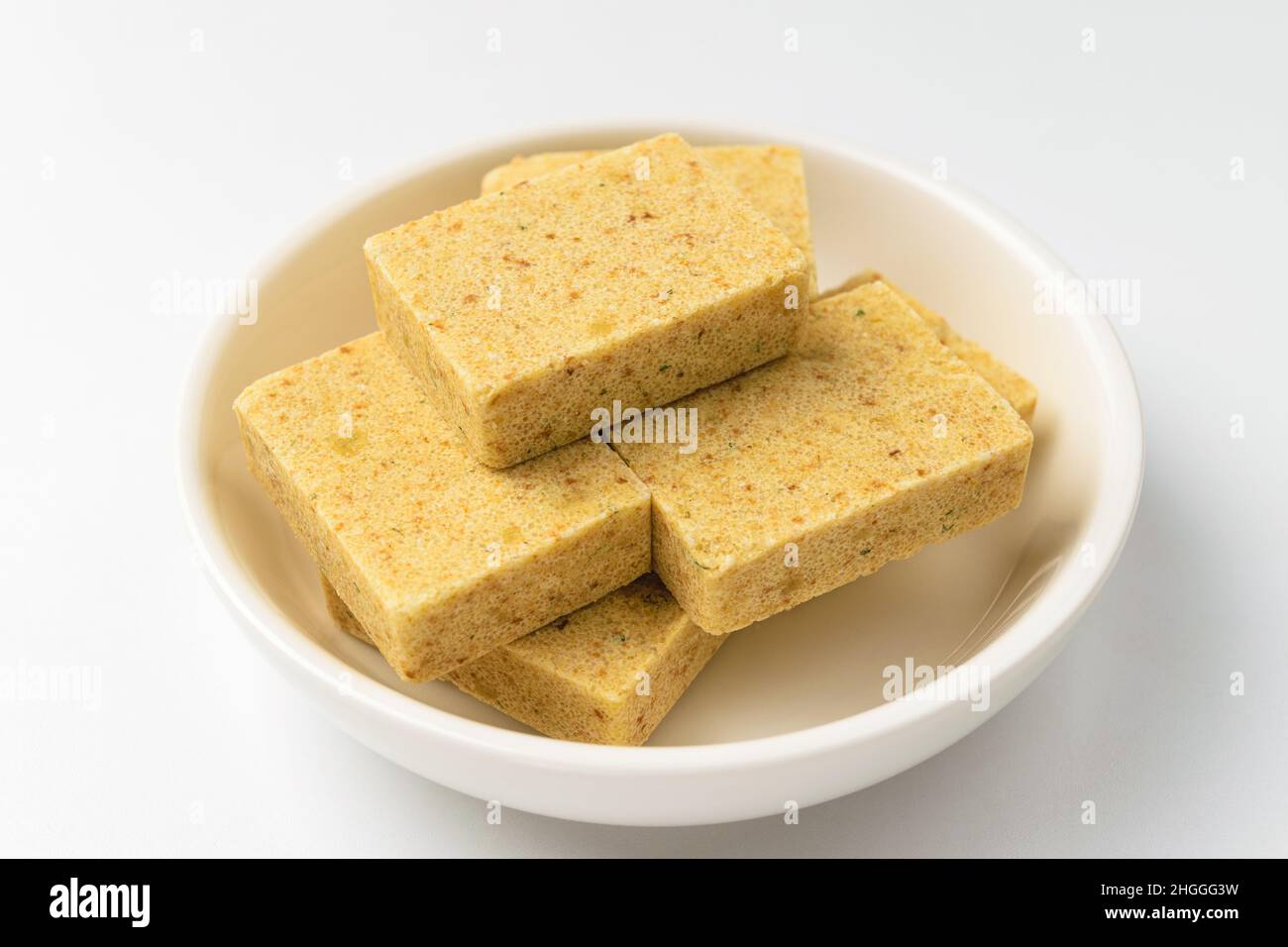 Chicken stock on white background Stock Photo - Alamy