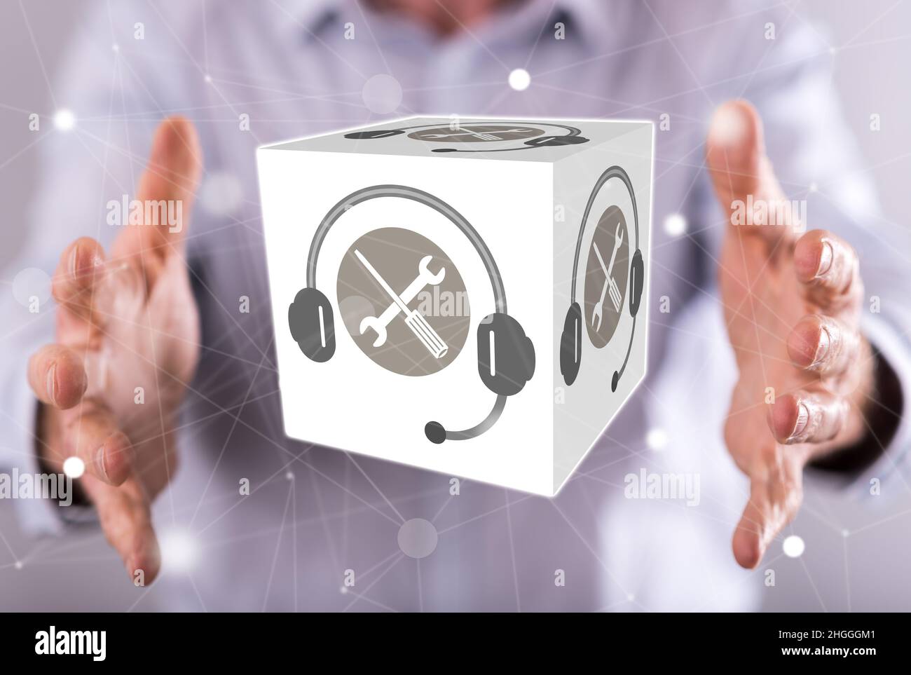 Technical support concept between hands of a man in background Stock ...