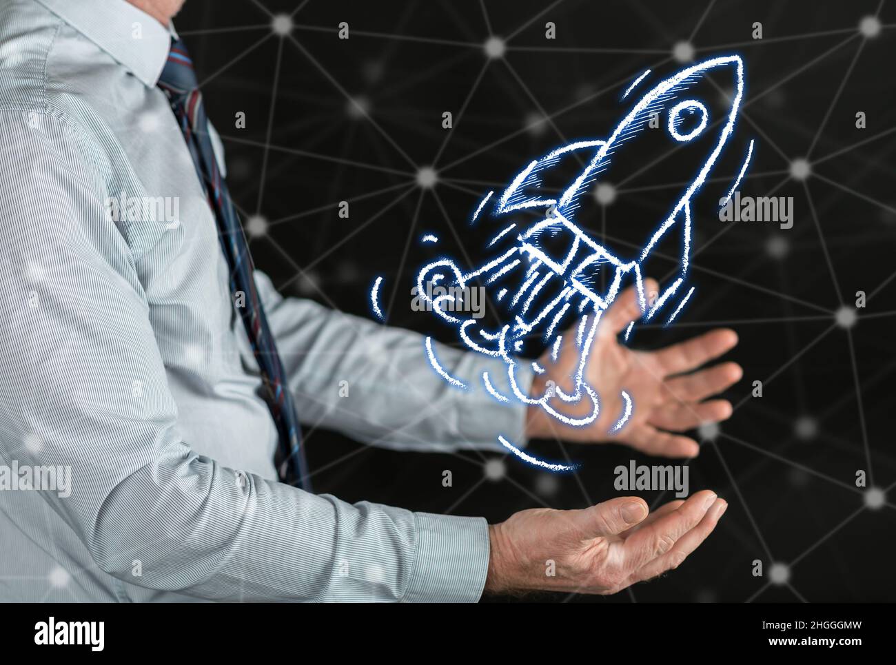 Start up concept above the hands of a man Stock Photo - Alamy