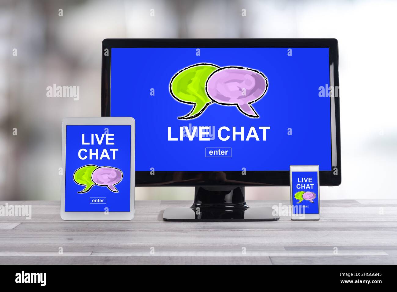 Live chat concept shown on different information technology devices ...