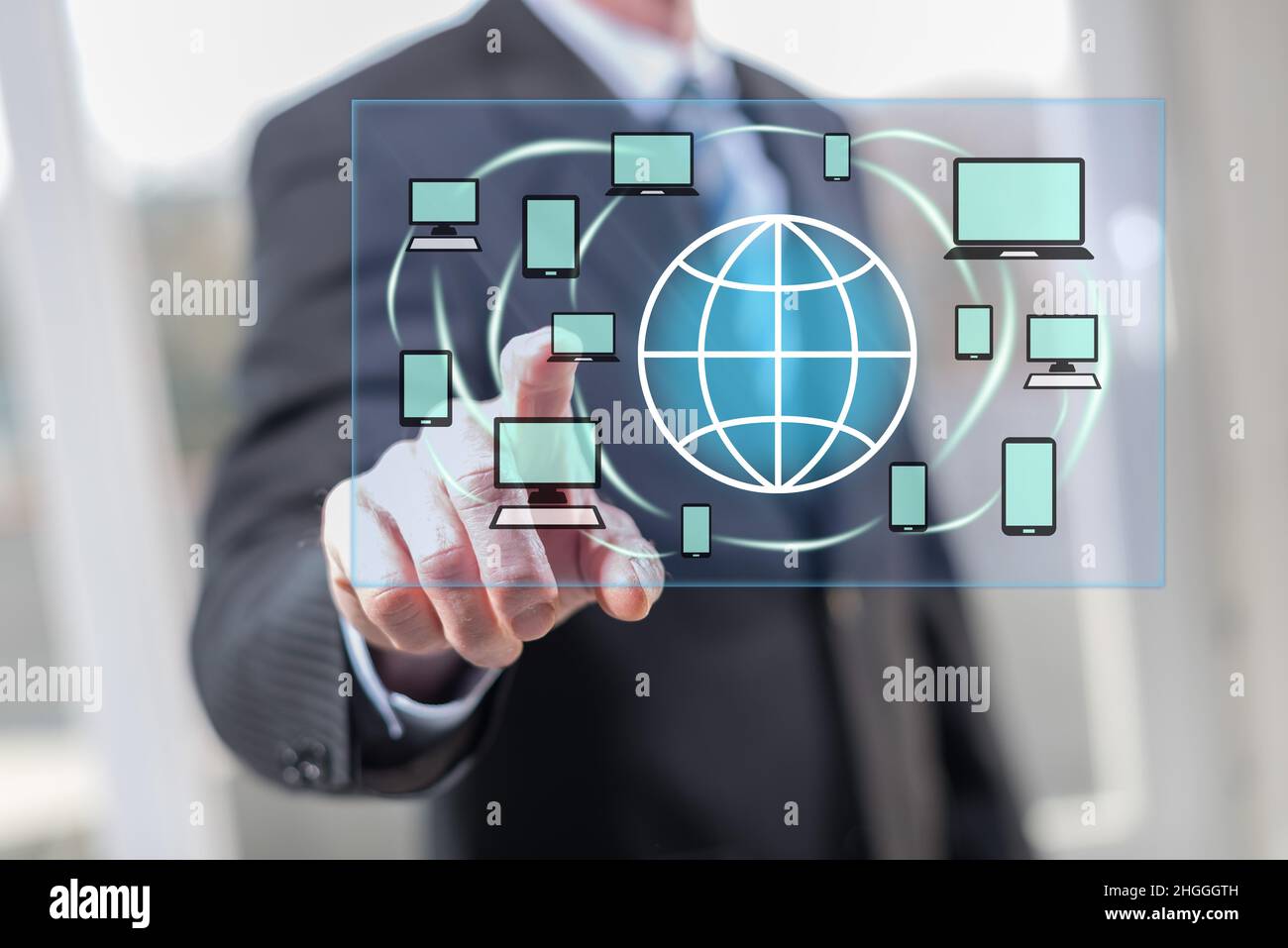 Man touching a global connection concept on a touch screen with his ...