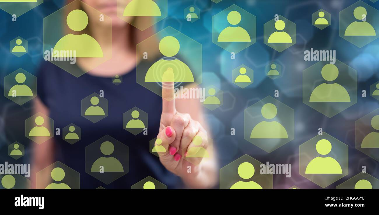 Woman touching a social network concept on a touch screen with her ...