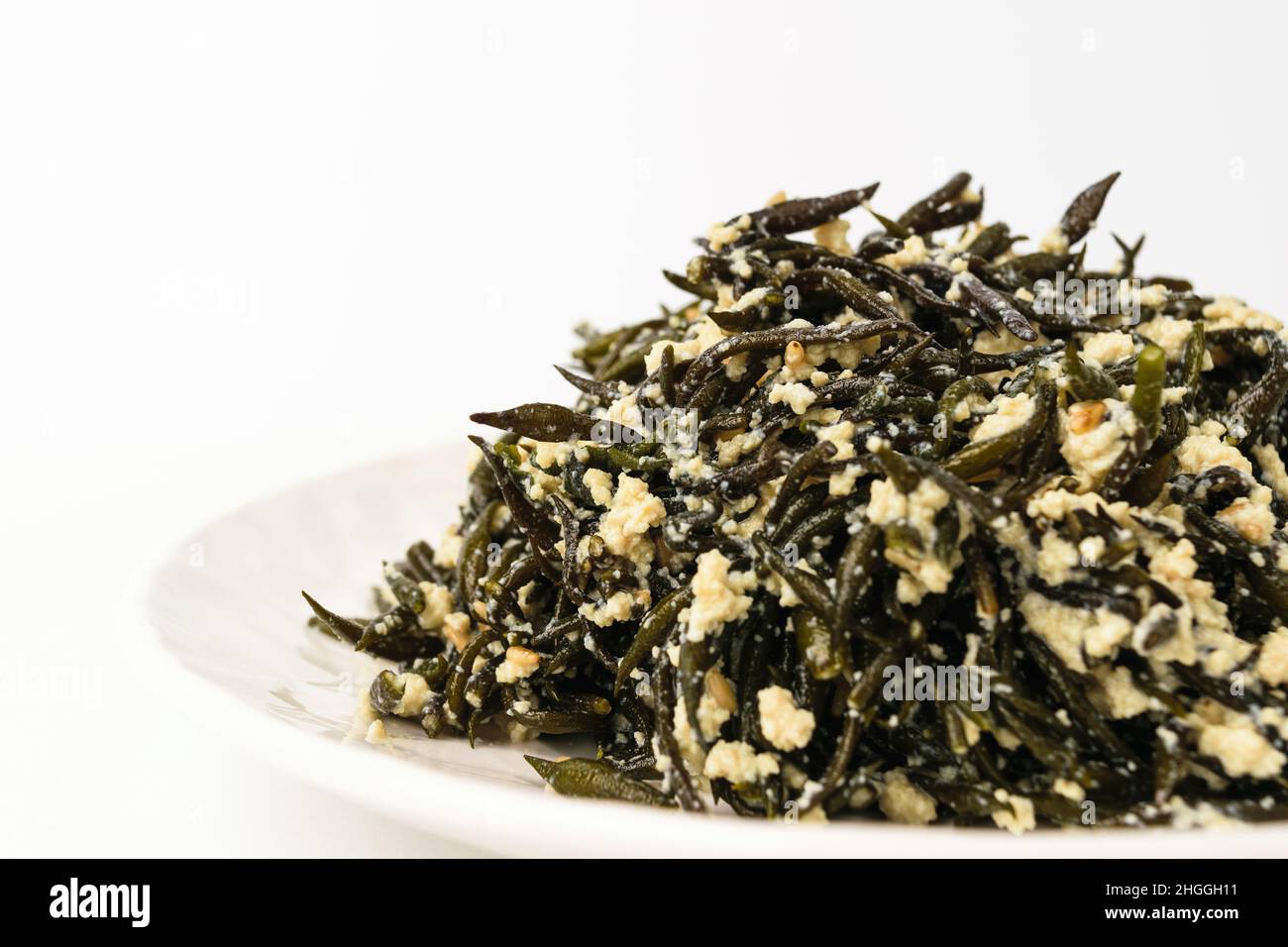 Sea weed fusiforme herb on white background Stock Photo - Alamy