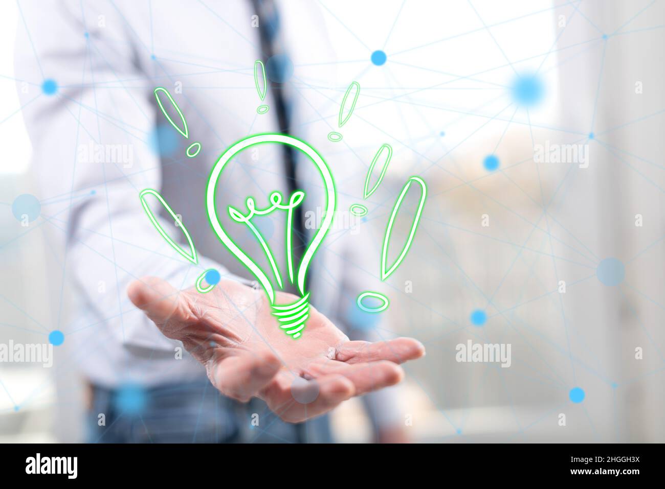 Idea concept above the hand of a man in background Stock Photo - Alamy