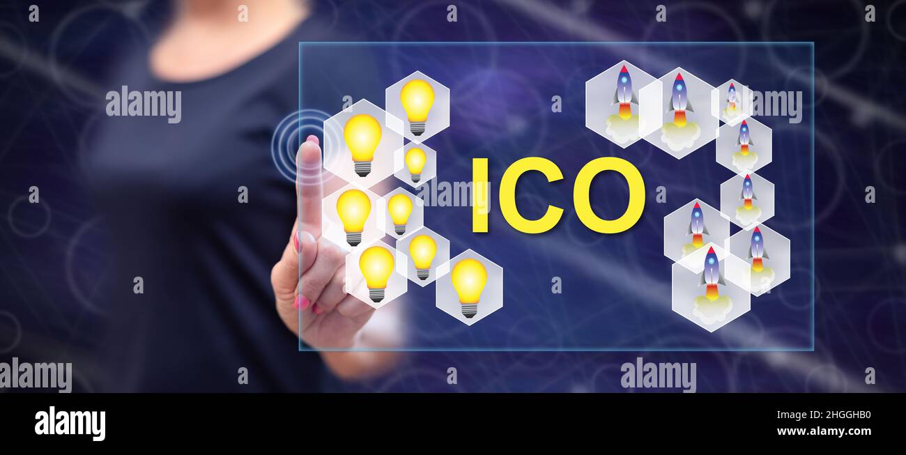 Woman touching an ico concept on a touch screen with her finger Stock ...