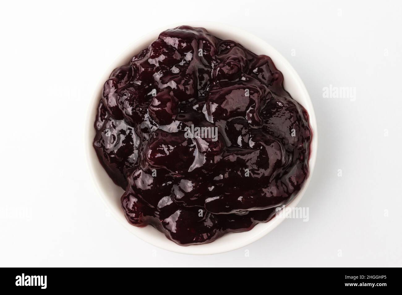 Grape jam on a white background Stock Photo - Alamy