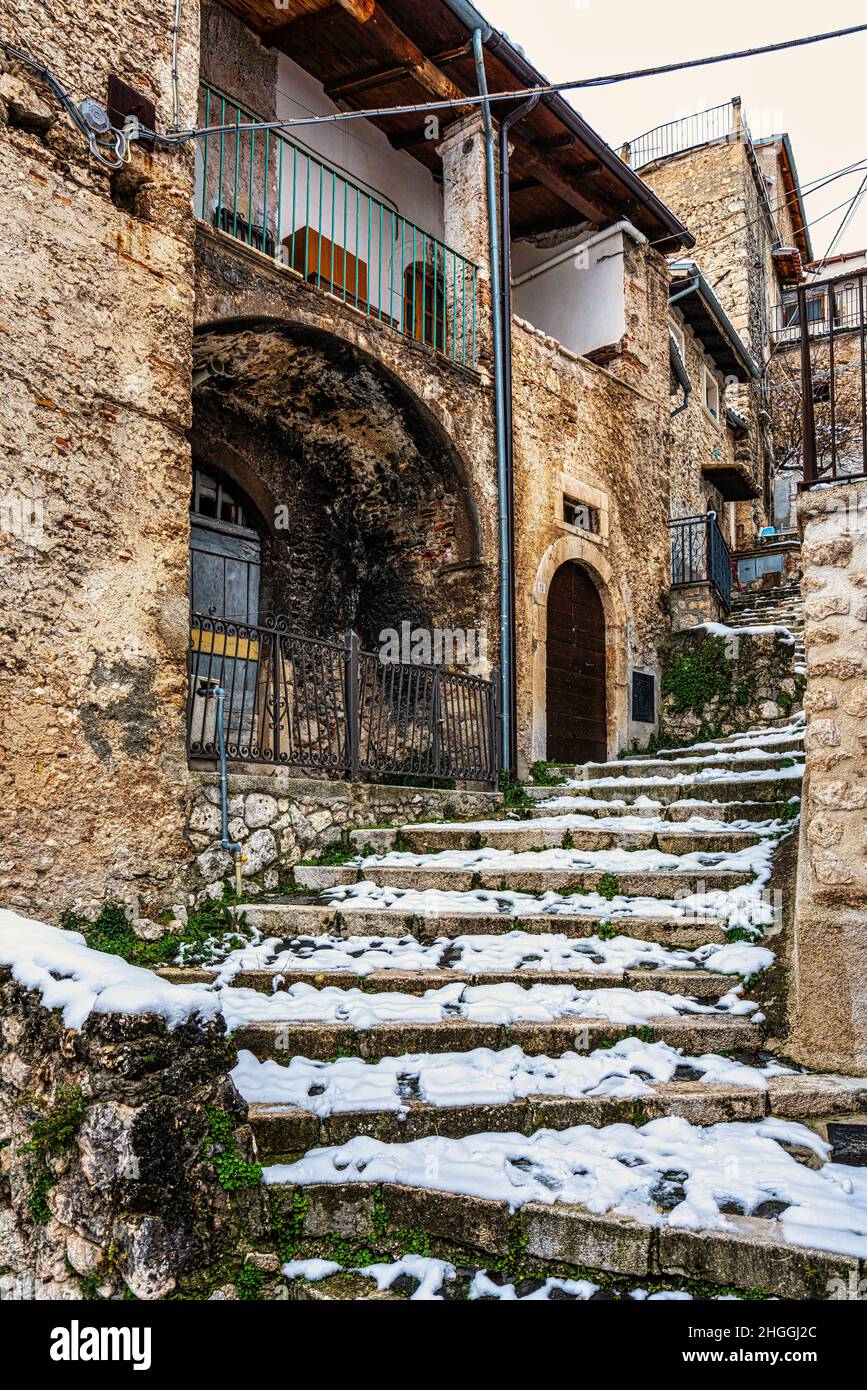 Steps, alleys and snow-covered roofs in the small mountain town of ...