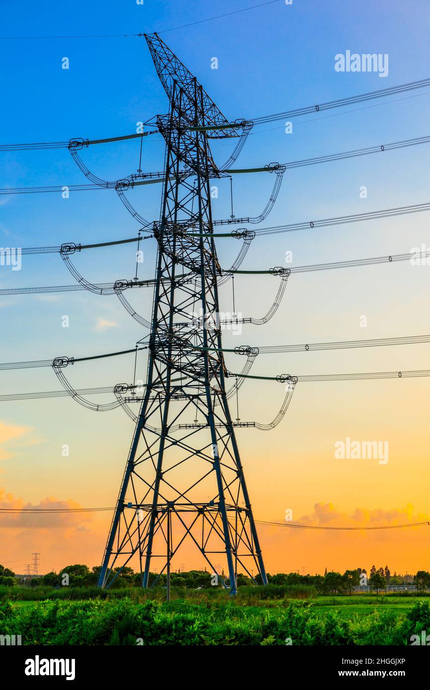 High voltage power tower industrial landscape at sunrise,urban power ...