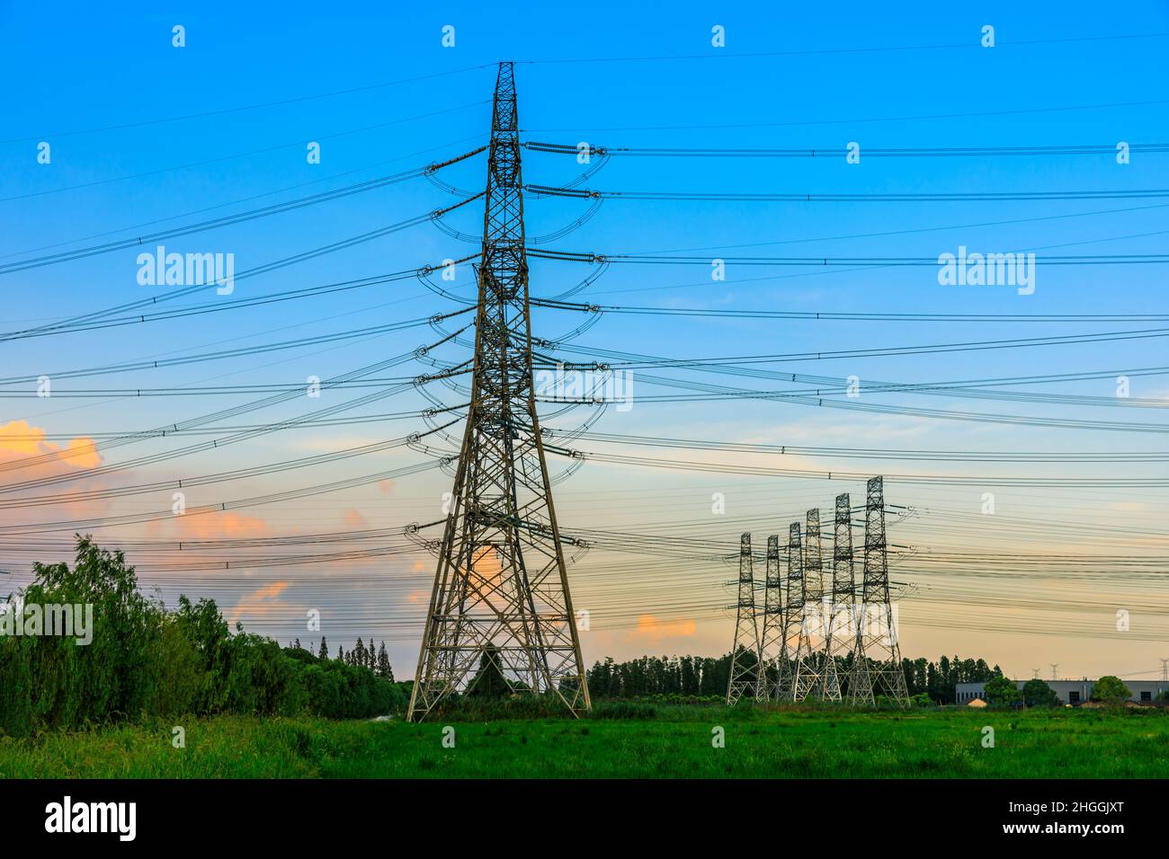 High voltage power tower industrial landscape at sunrise,urban power ...