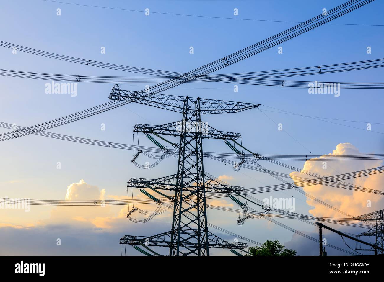 High voltage power tower industrial landscape at sunrise,urban power ...