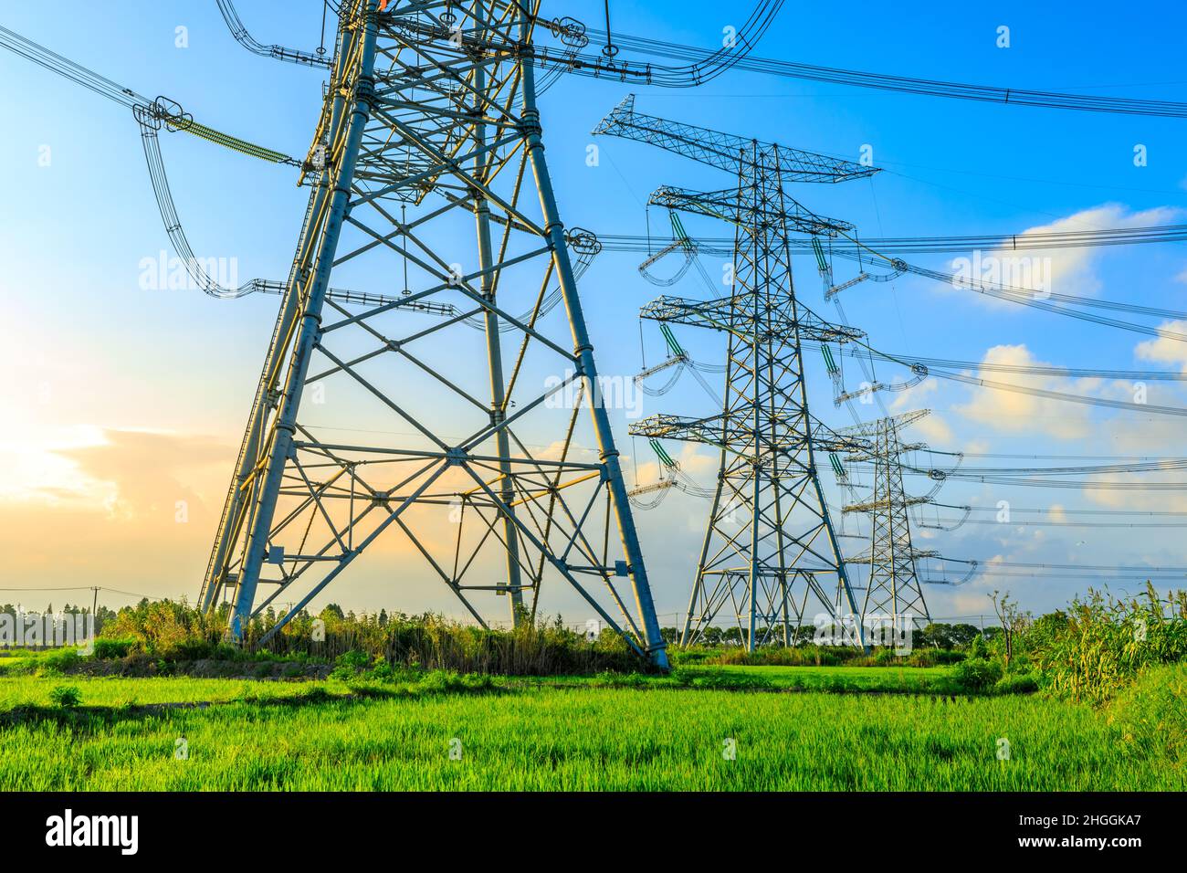 High voltage power tower industrial landscape at sunrise,urban power ...