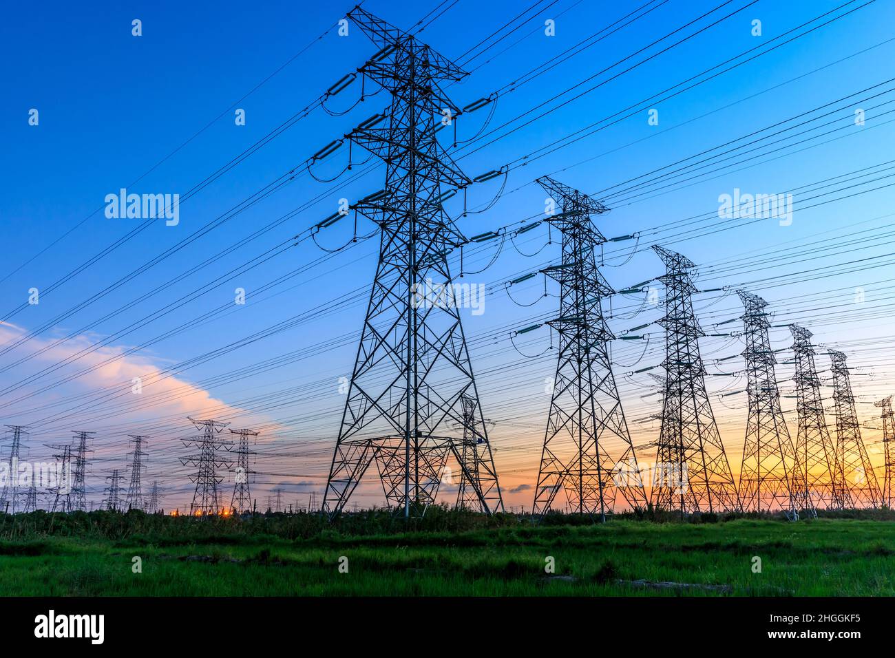 High voltage power tower industrial landscape at sunrise,urban power ...