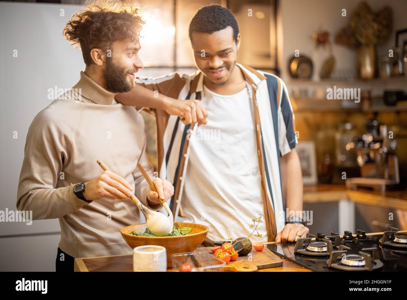 Latino couple talking kitchen hi-res stock photography and images - Alamy