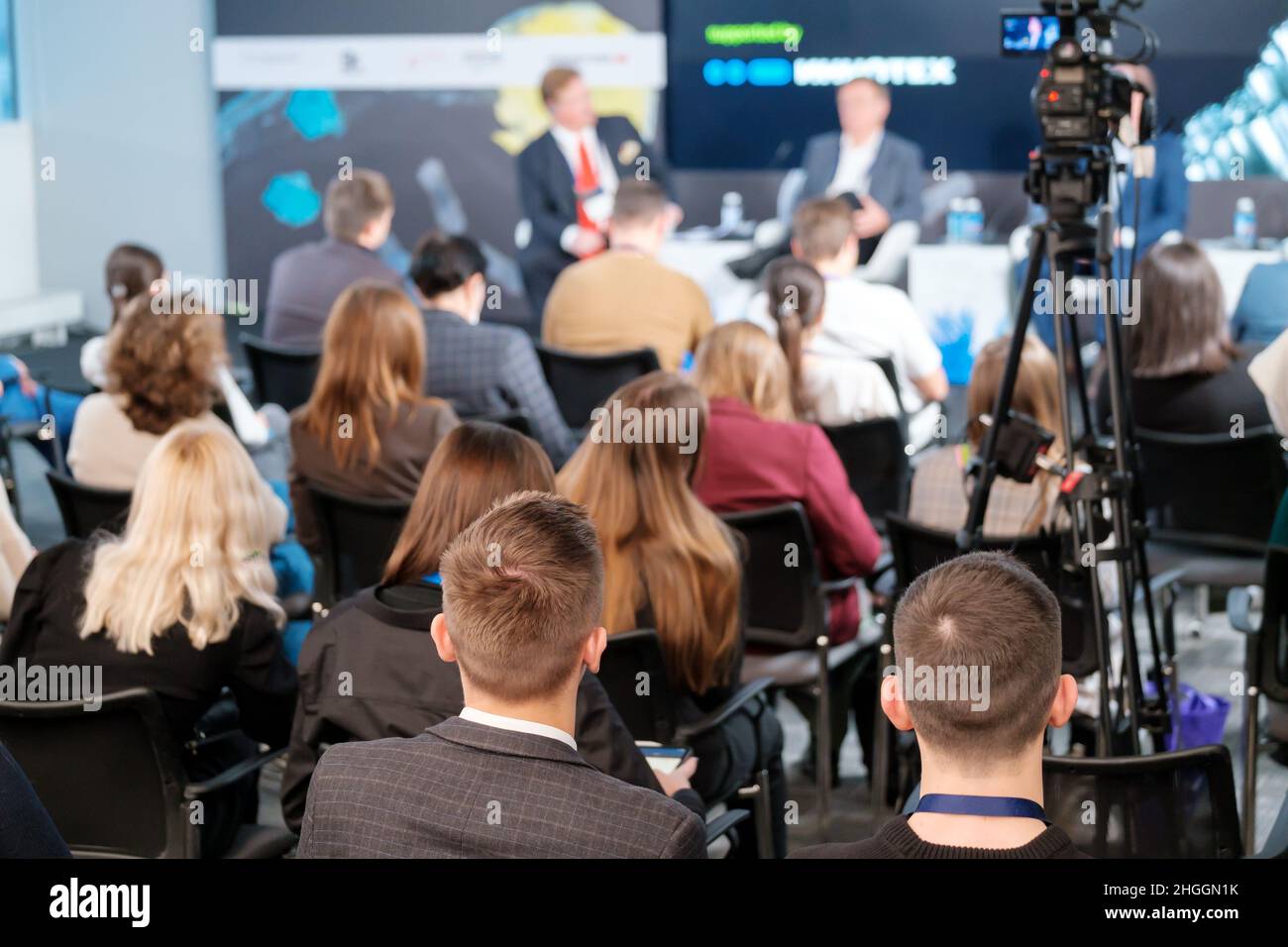 Businesspeople listening speakers during conference hi-res stock ...