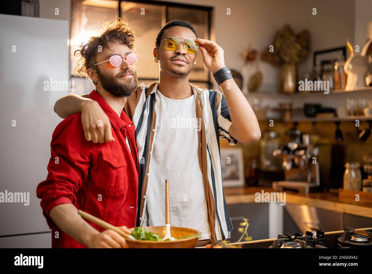 Two guys cooking healthy together at home Stock Photo - Alamy