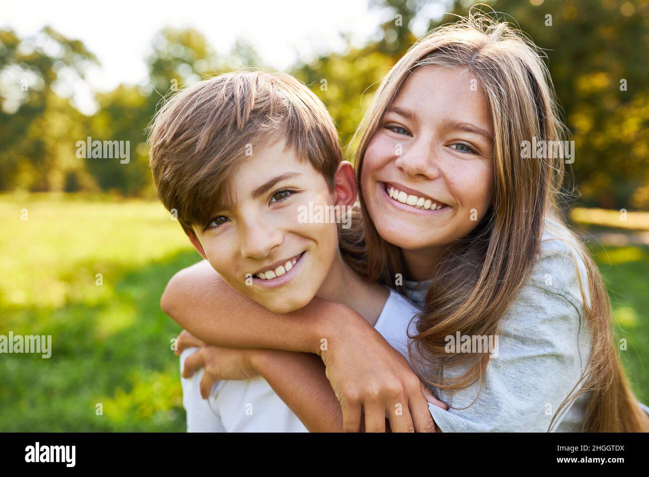 Brother sister embrace hi-res stock photography and images - Alamy