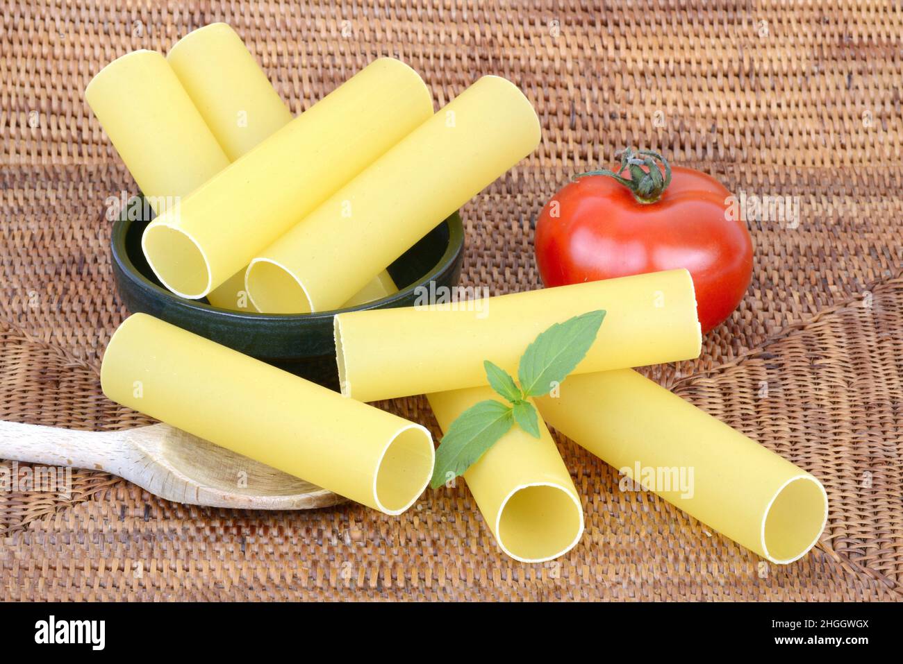 Italian pasta, cannelloni with fresh tomato and basil Stock Photo - Alamy