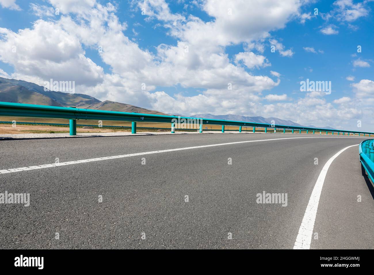 Highway ground and mountain natural scenery under blue sky.Landscape ...