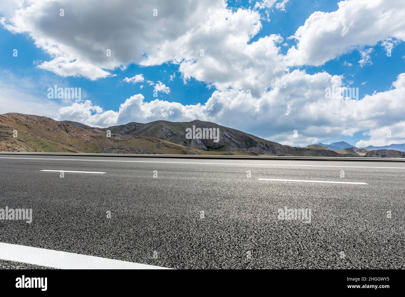 Highway ground and mountain natural scenery under blue sky.Landscape ...