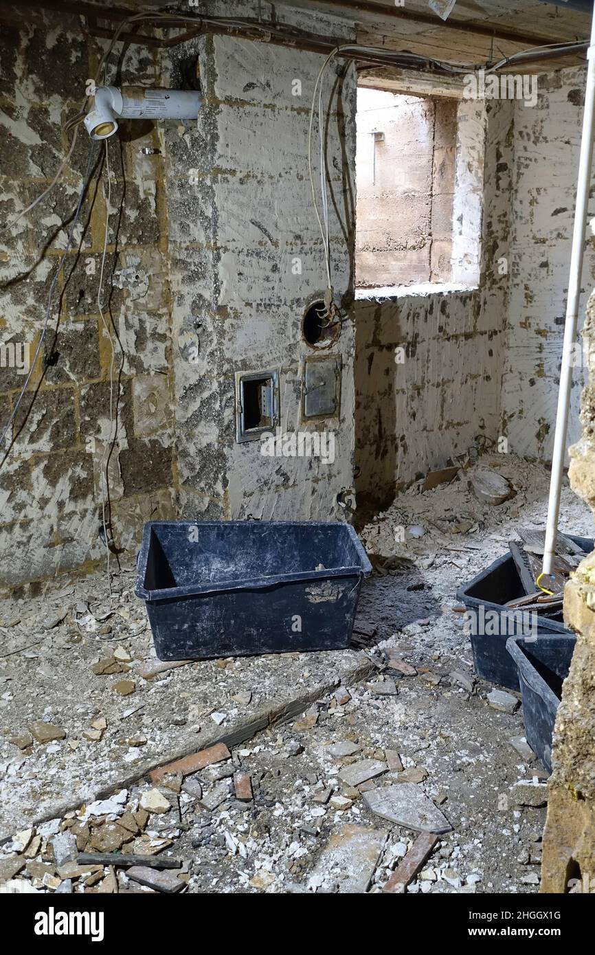 demolition work in the basement of a residential building after the ...