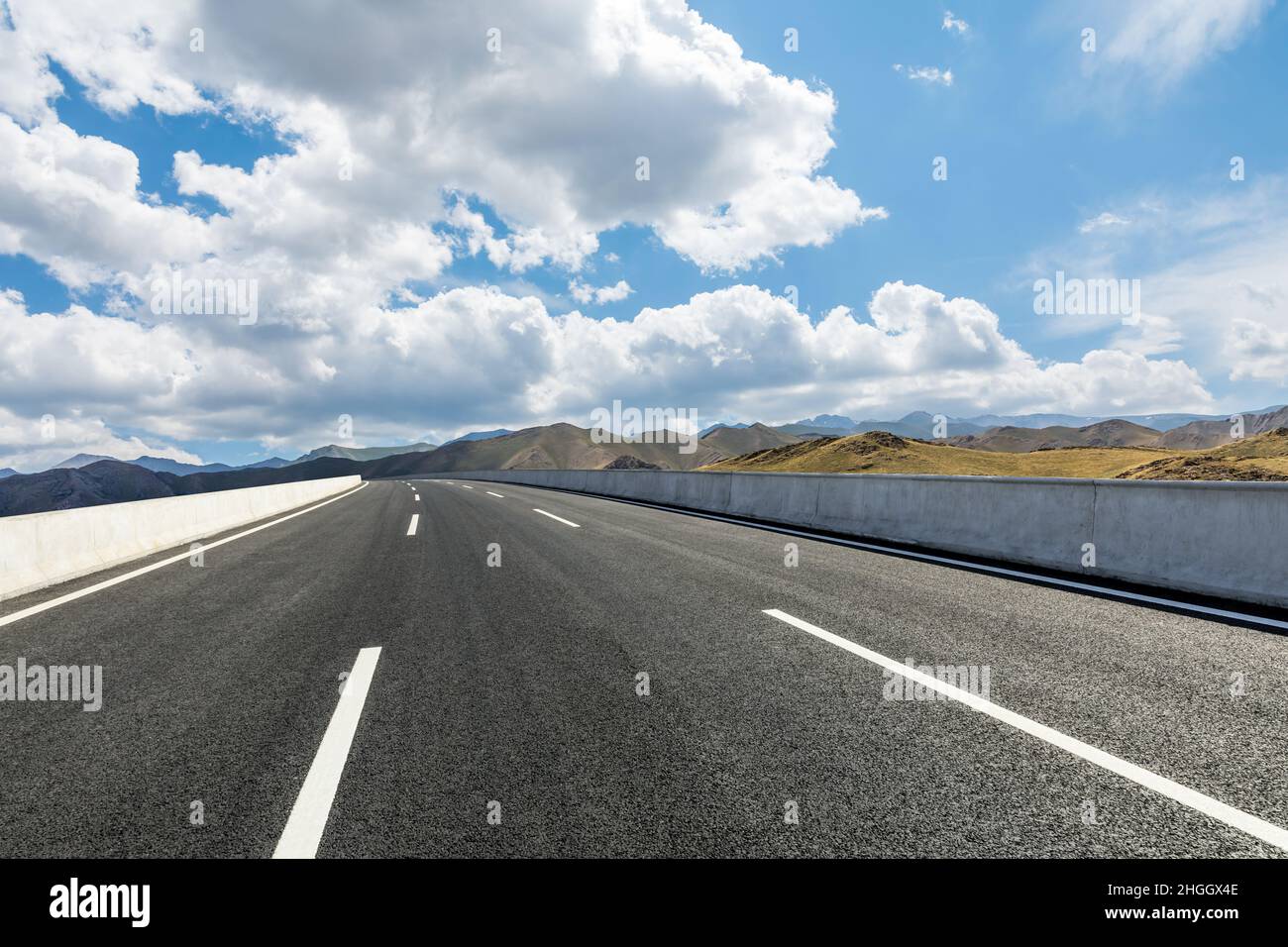 Highway ground and mountain natural scenery under blue sky.Landscape ...
