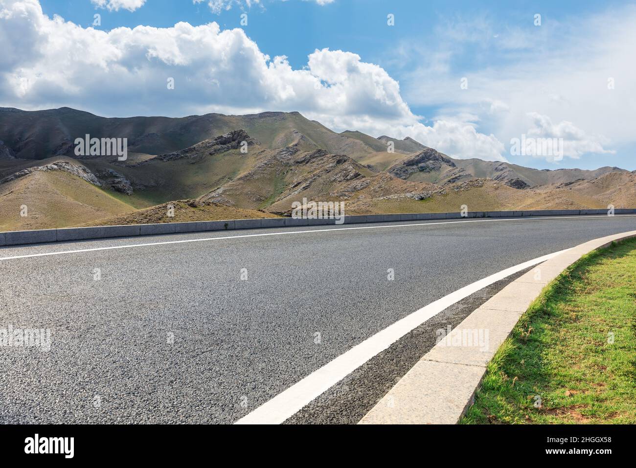 Highway ground and mountain natural scenery under blue sky.Landscape ...