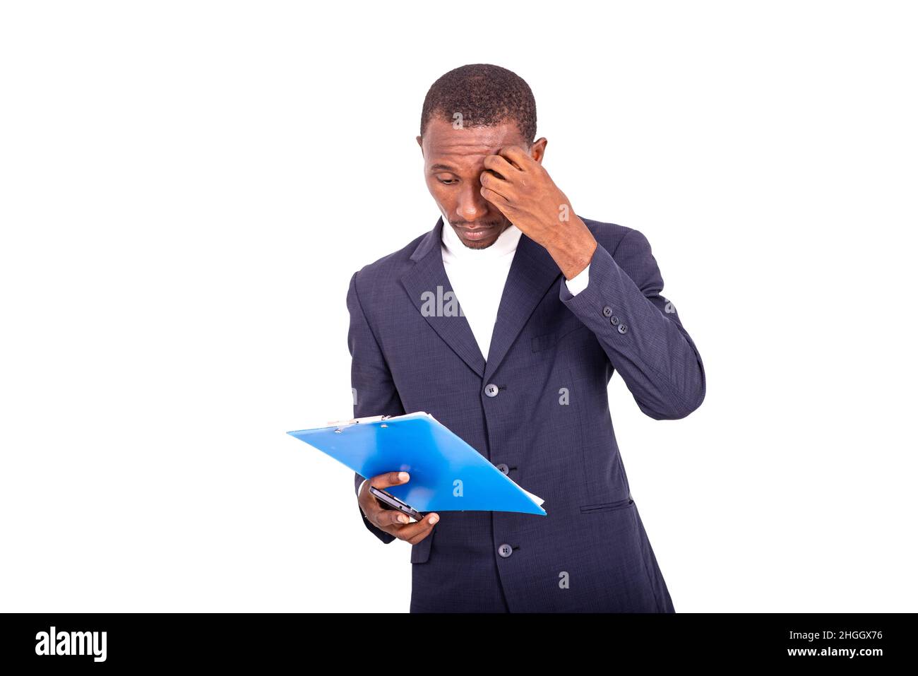 handsome businessman in jacket standing on white background looking at ...
