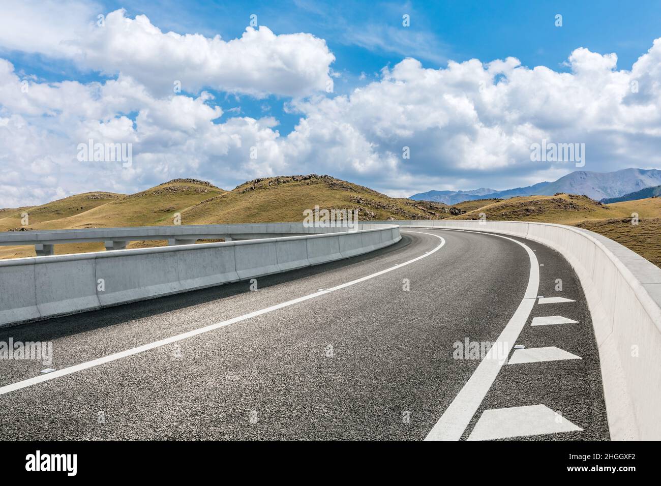 Highway ground and mountain natural scenery under blue sky.Landscape ...