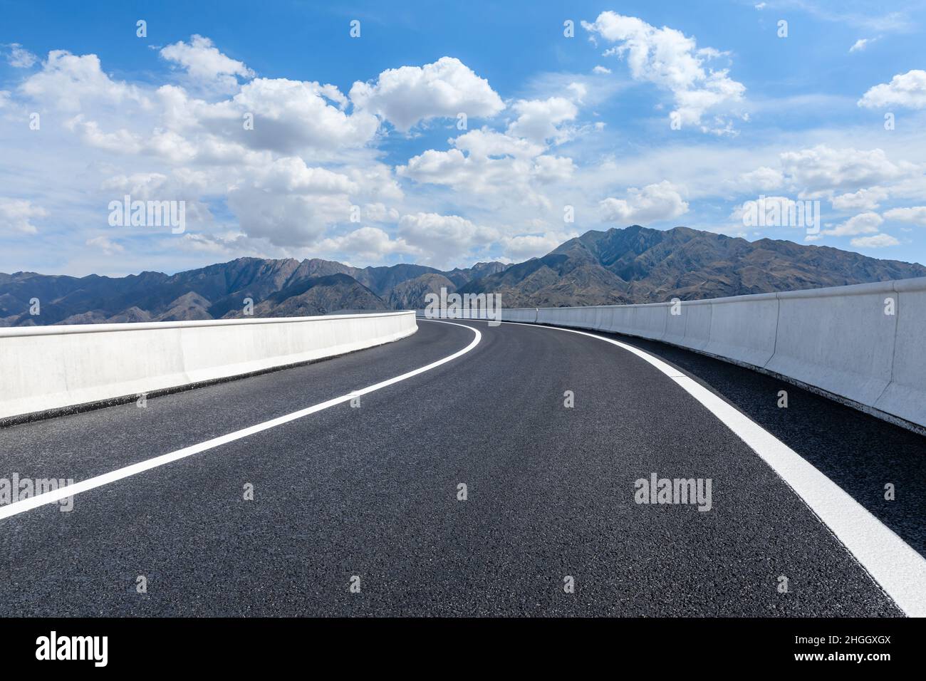 Highway ground and mountain natural scenery under blue sky.Landscape ...